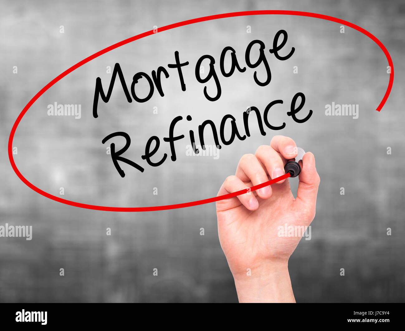 Man Hand writing Mortgage Refinance with black marker on visual screen ...