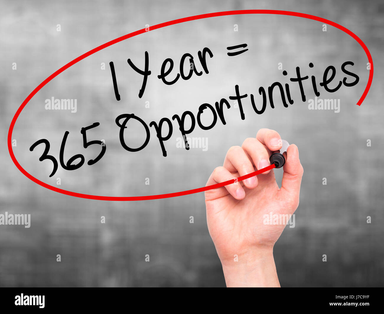 Man Hand writing 1 Year = 365 Opportunities with black marker on visual ...