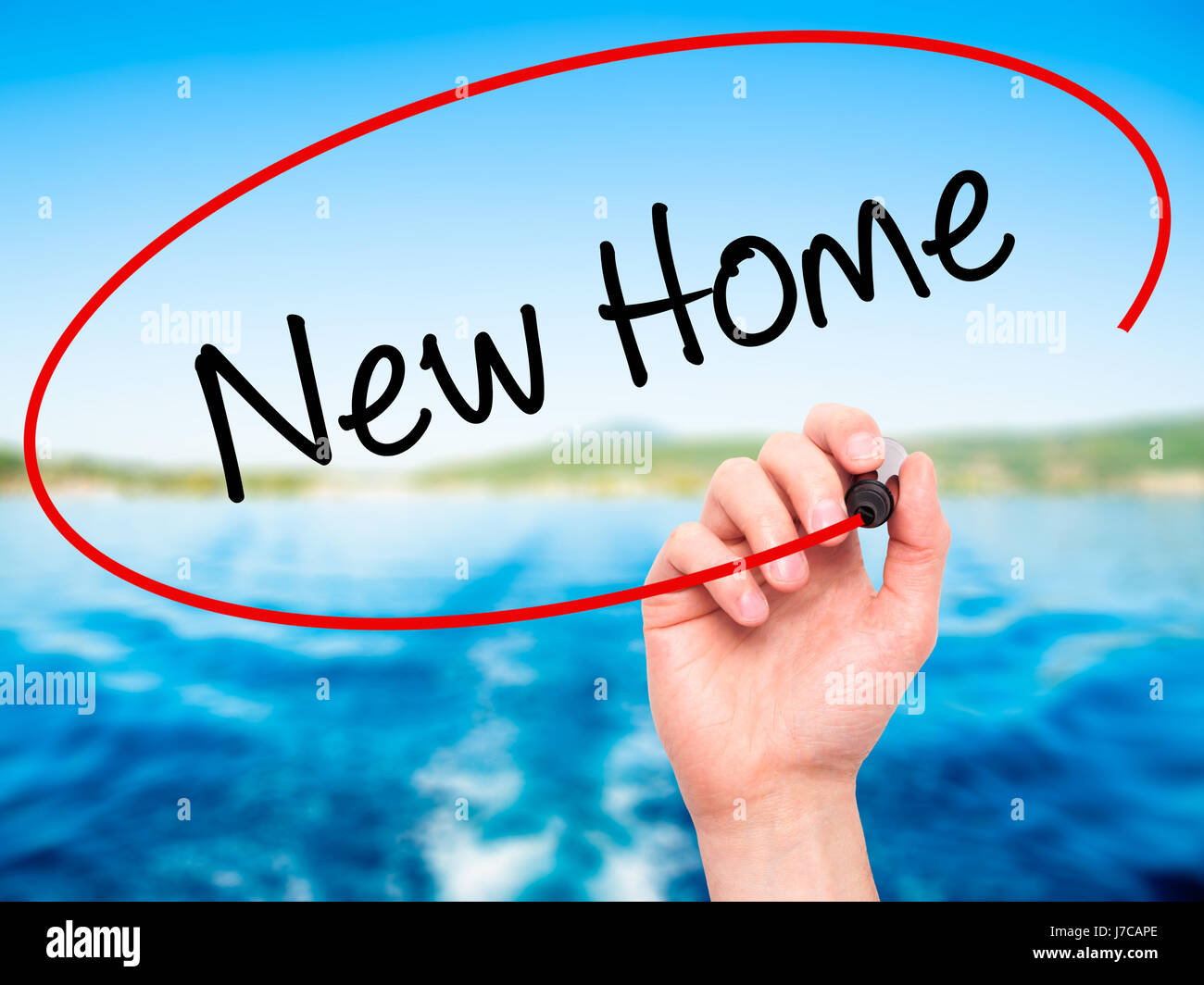 Man Hand writing New Home with black marker on visual screen. Isolated ...