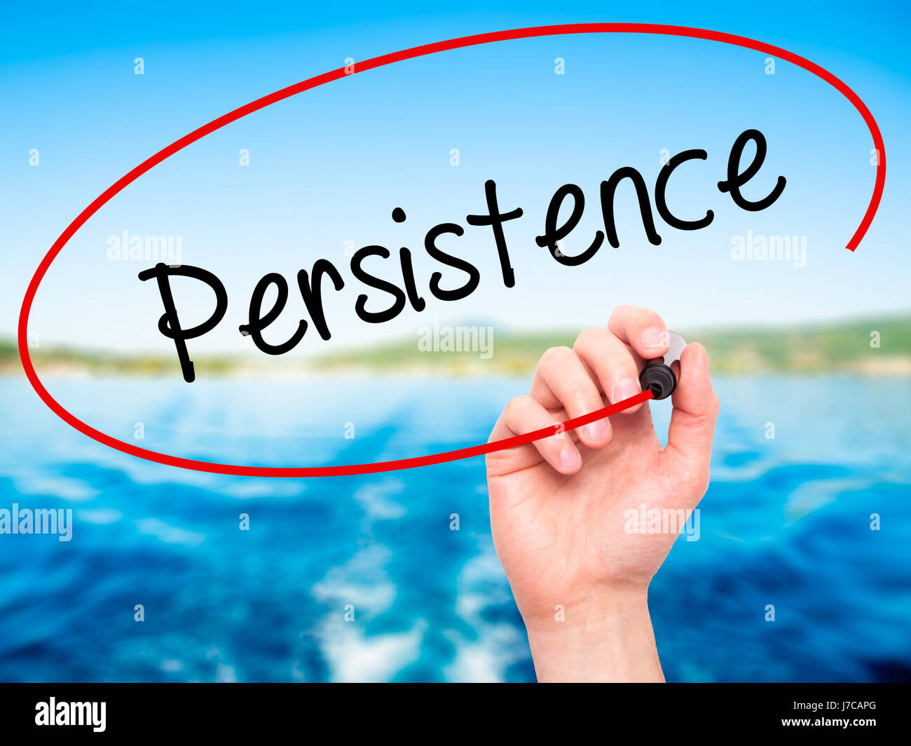 Man Hand writing Persistence with black marker on visual screen ...