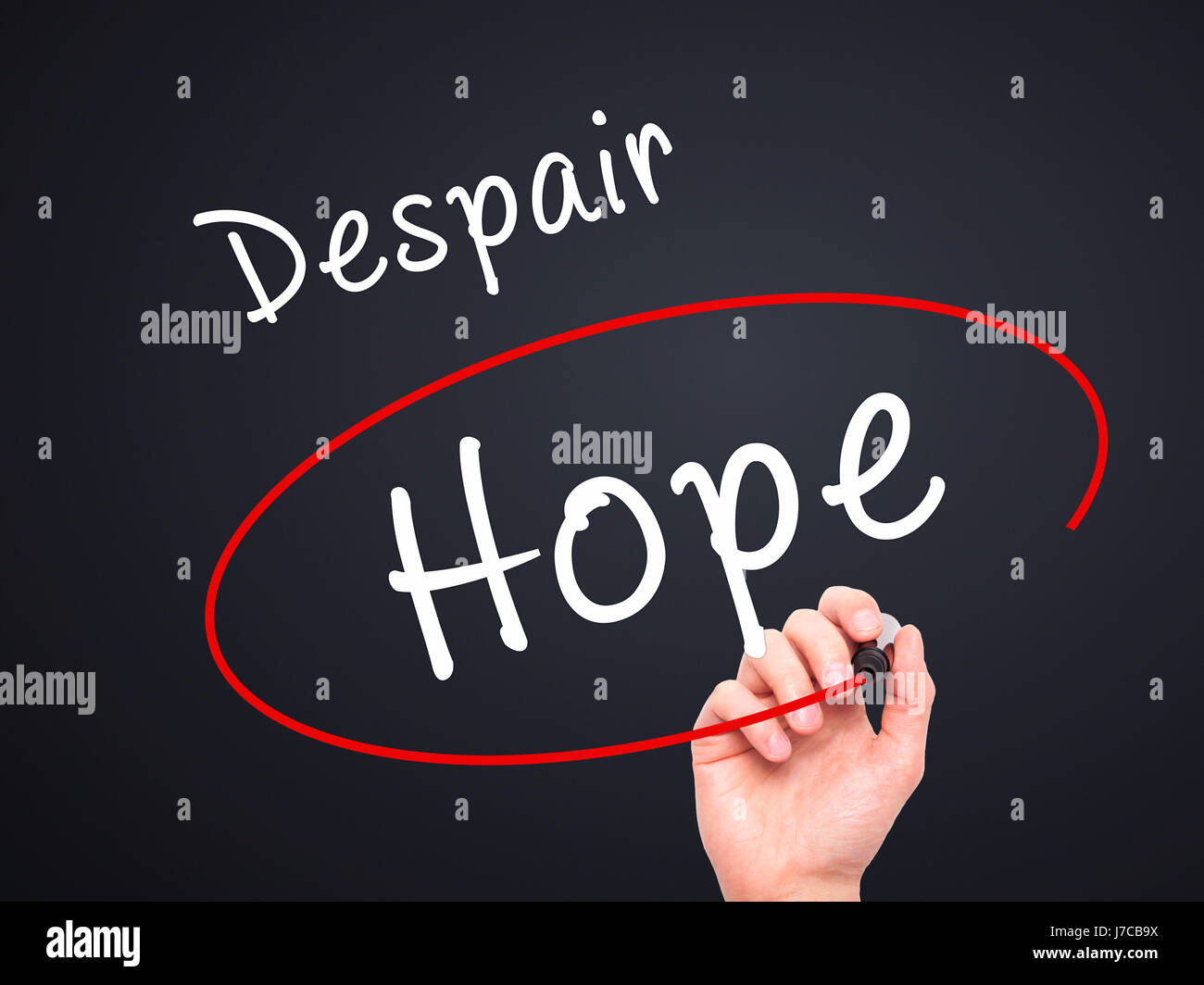 Man Hand writing and choosing Hope instead of Despair with black marker ...