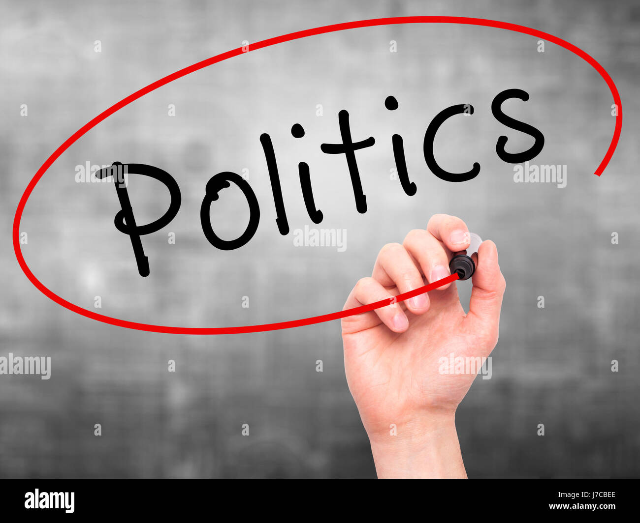 Man Hand writing Politics with black marker on visual screen. Isolated ...