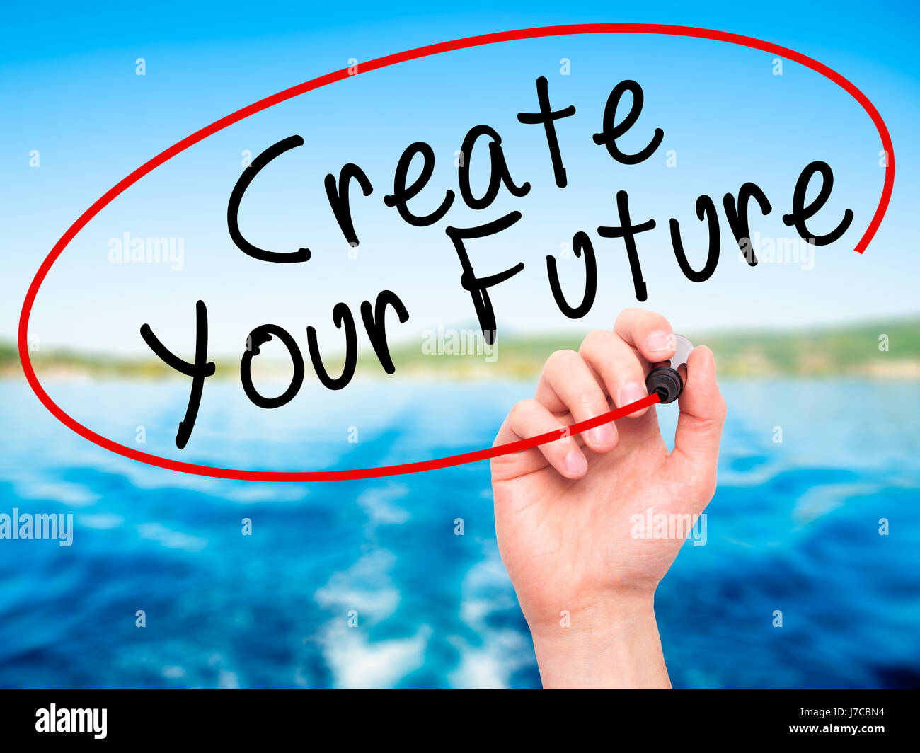 Man Hand writing Create Your Future with black marker on visual screen ...