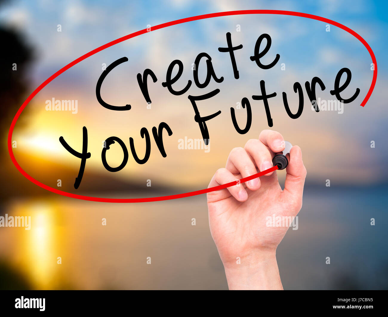 Man Hand writing Create Your Future with black marker on visual screen ...