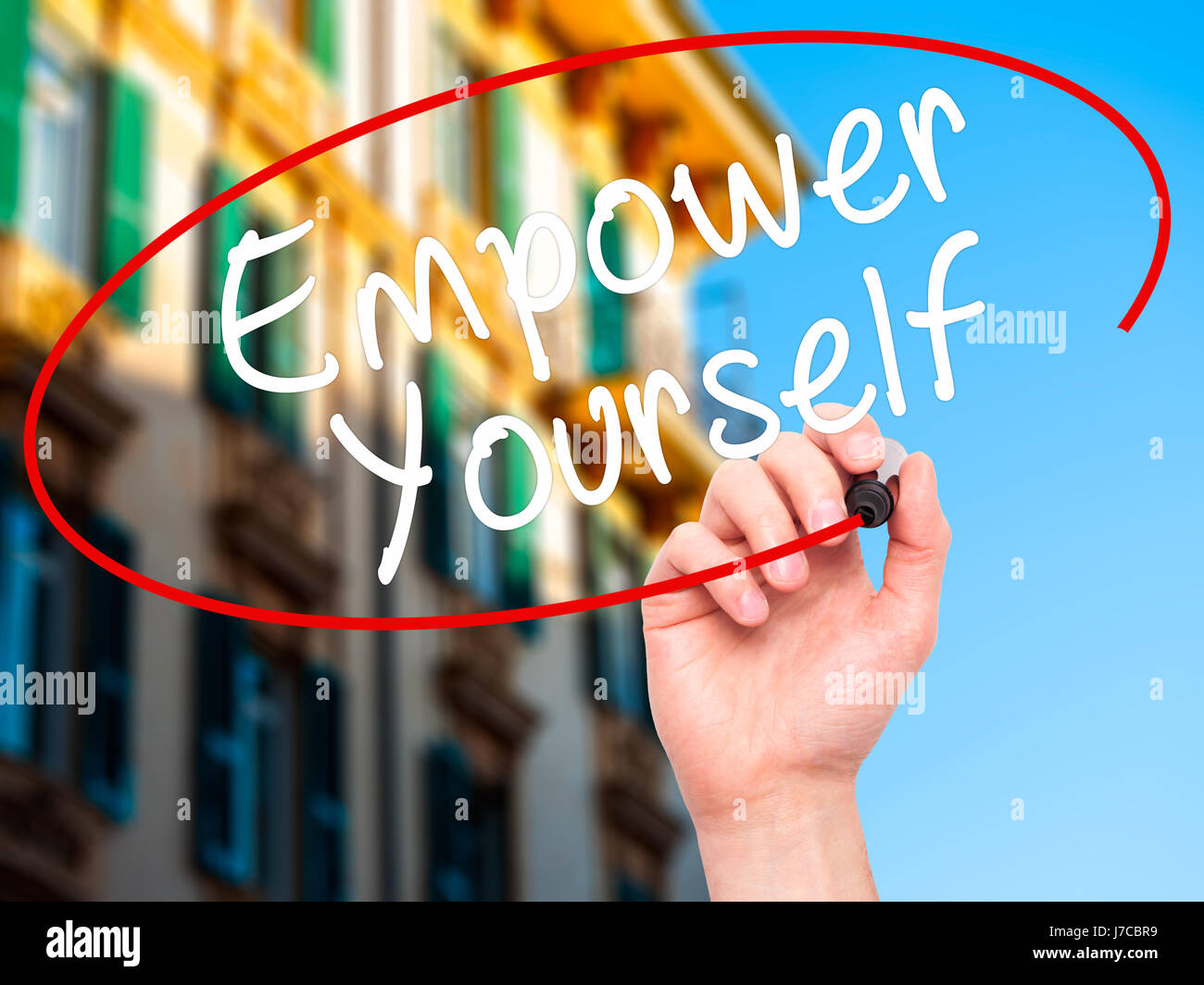 Man Hand writing Empower Yourself with black marker on visual screen ...