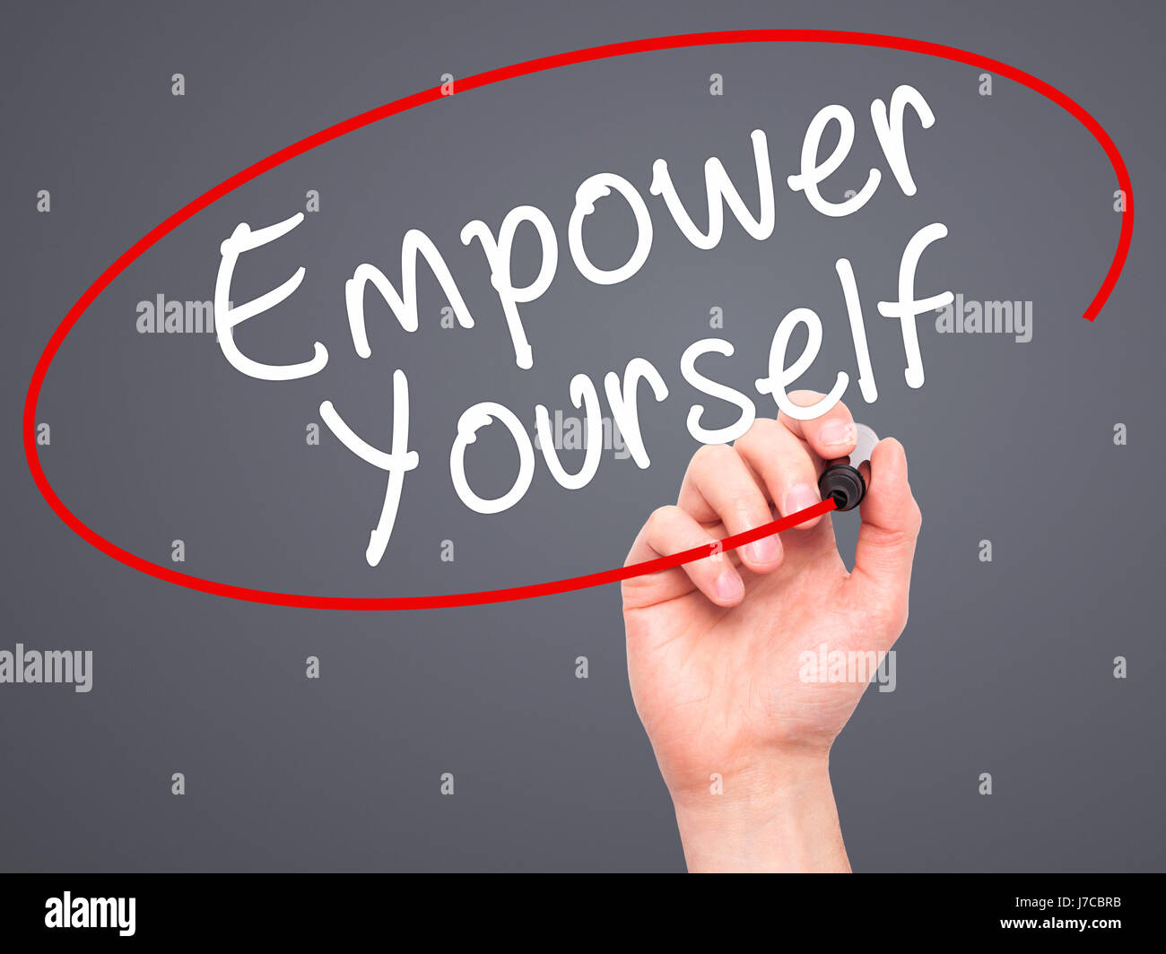 Man Hand writing Empower Yourself with black marker on visual screen ...