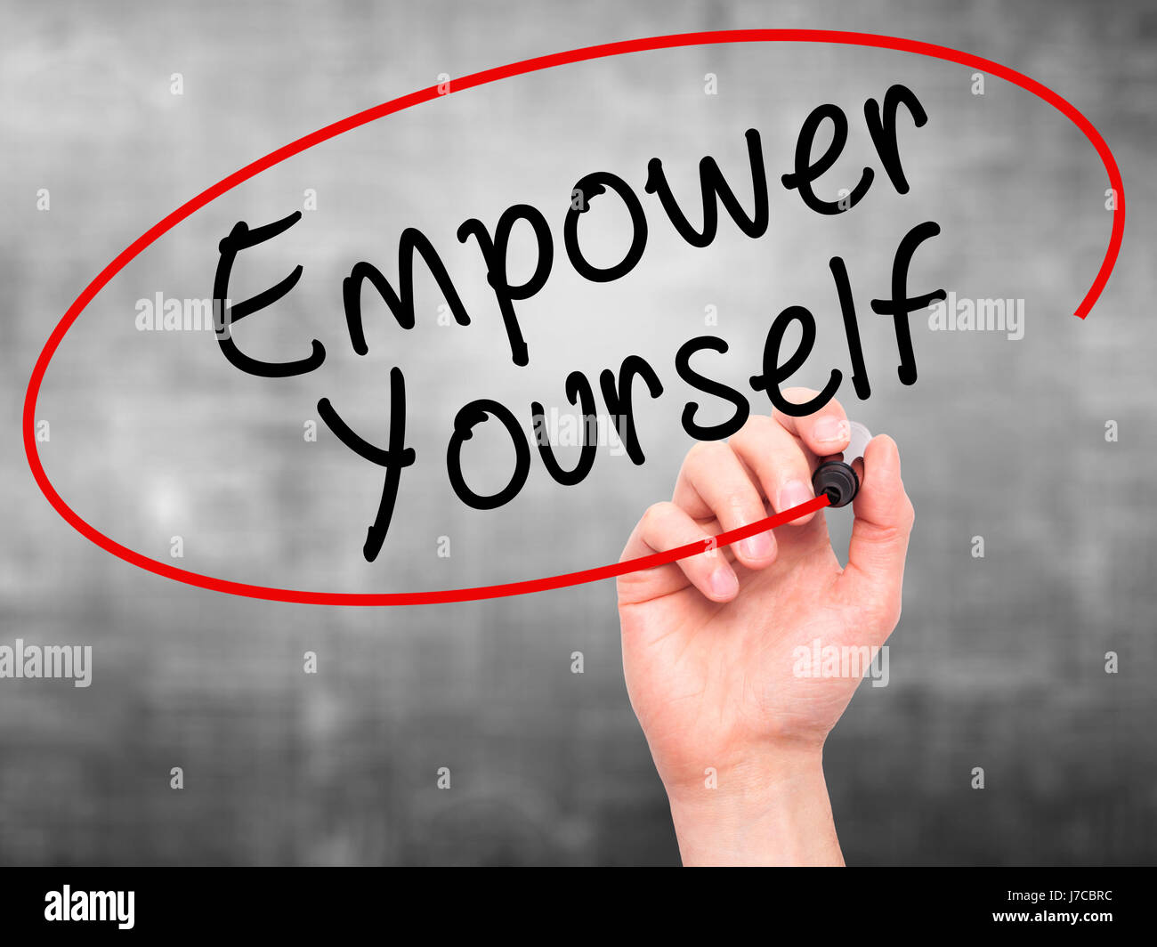 Man Hand writing Empower Yourself with black marker on visual screen ...