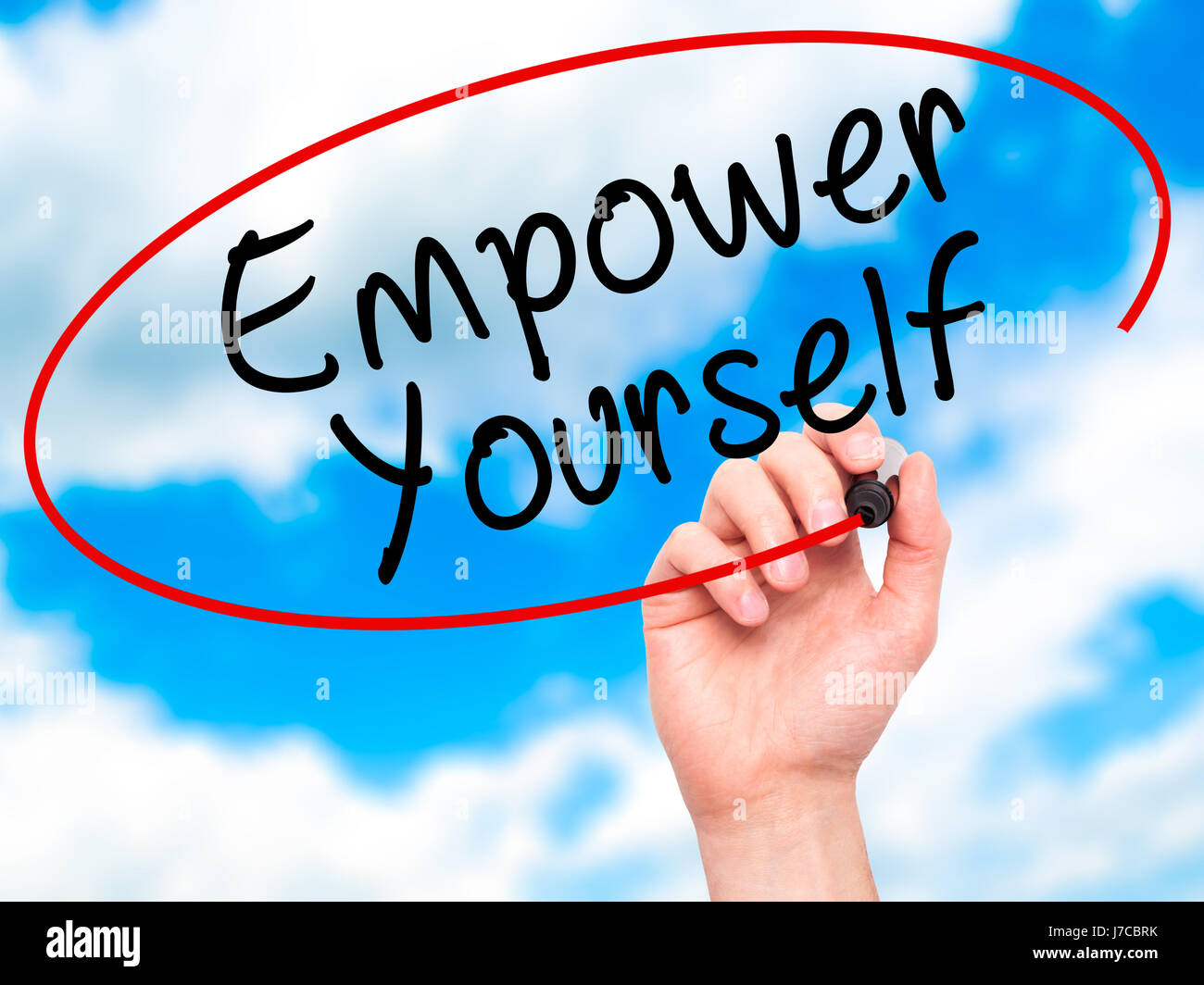 Man Hand writing Empower Yourself with black marker on visual screen ...