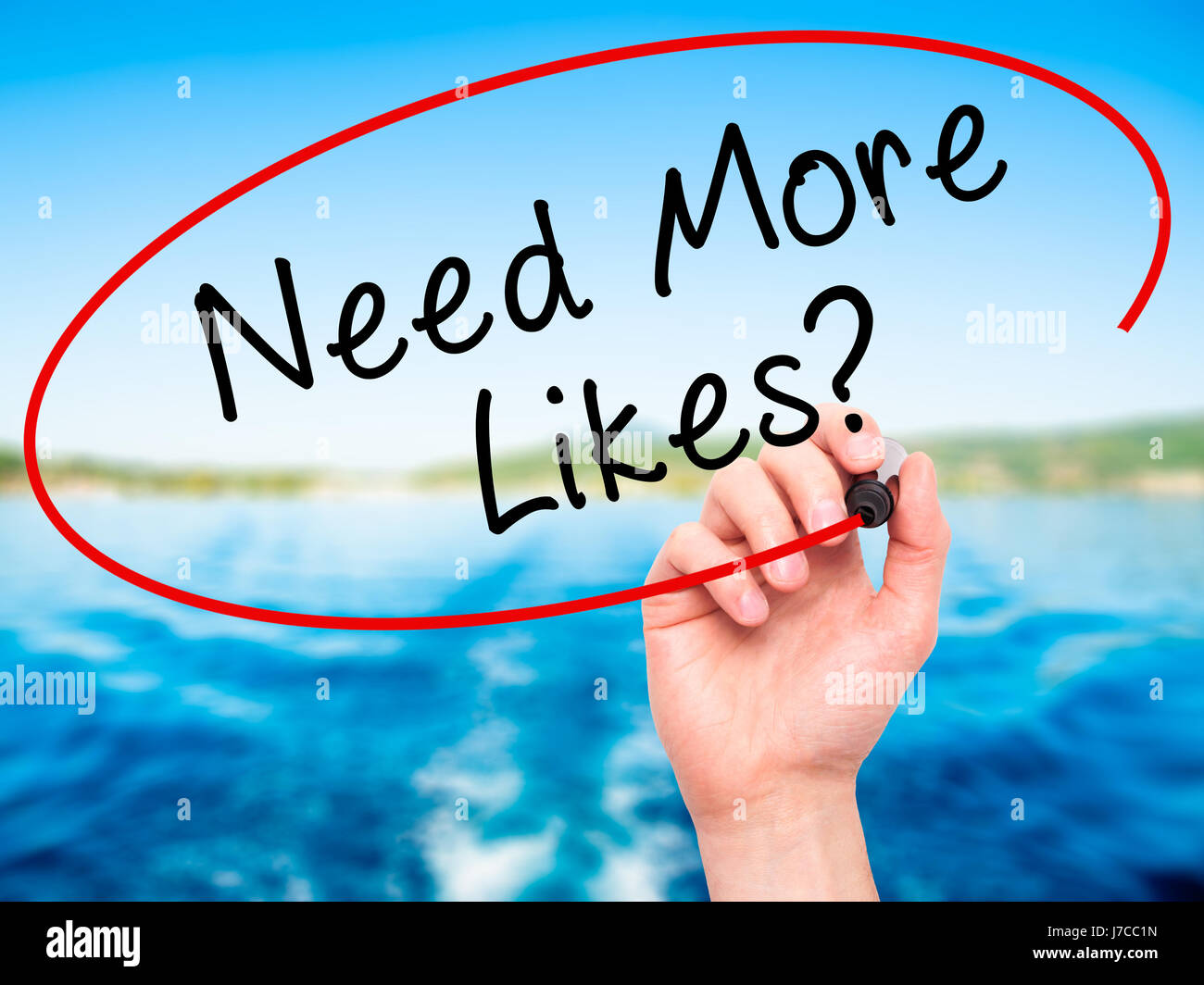 Man Hand writing Need More Likes? black marker on visual screen ...