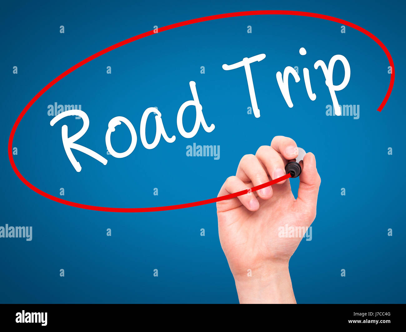 Man Hand writing Road Trip with black marker on visual screen. Isolated ...