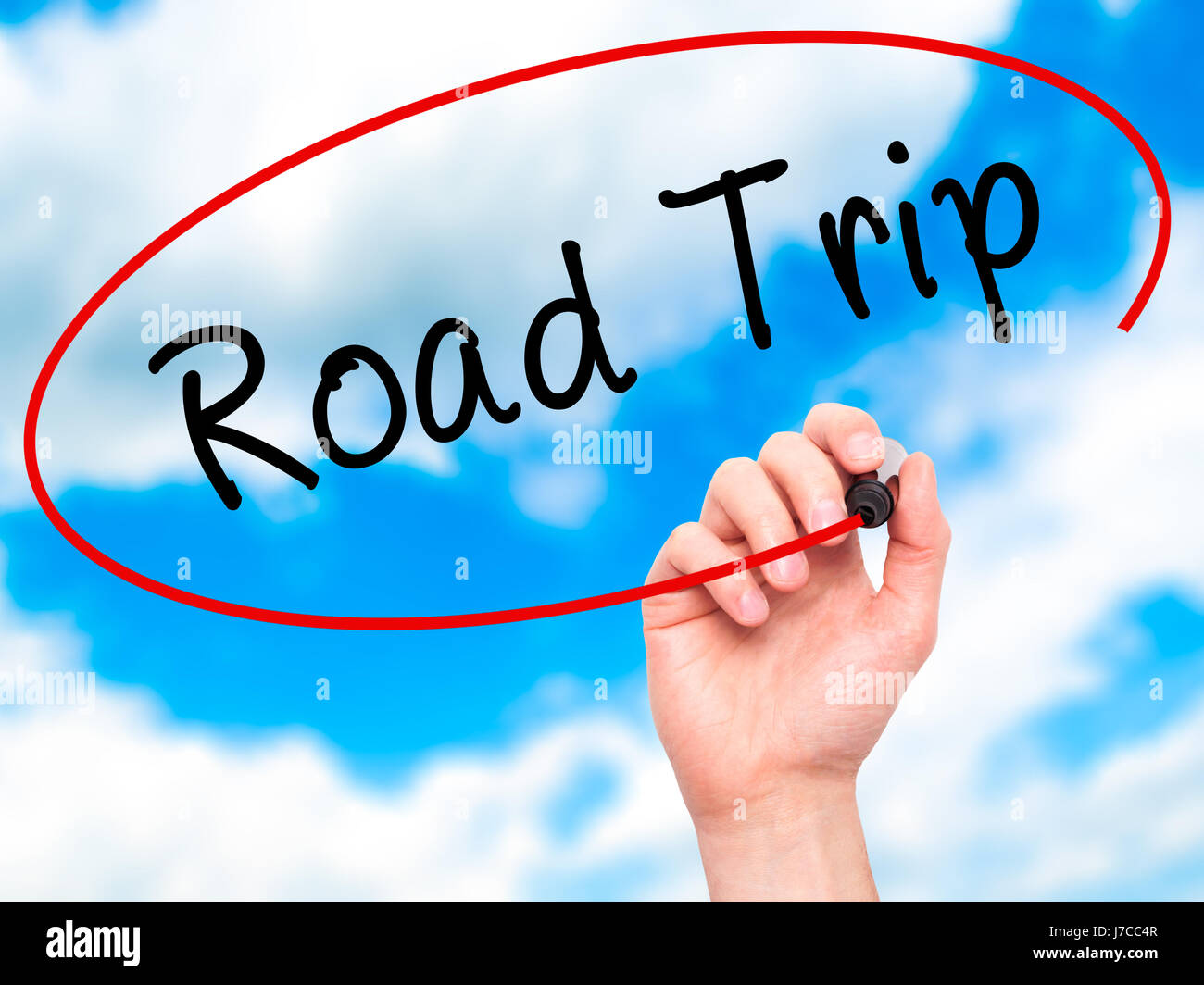 Man Hand writing Road Trip with black marker on visual screen. Isolated ...