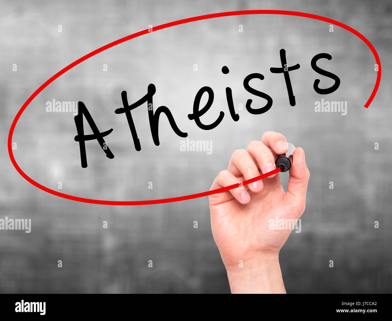 Man Hand writing Atheists with black marker on visual screen. Isolated ...