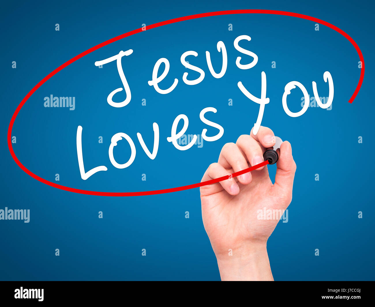 Man Hand writing Jesus Loves You with black marker on visual screen ...