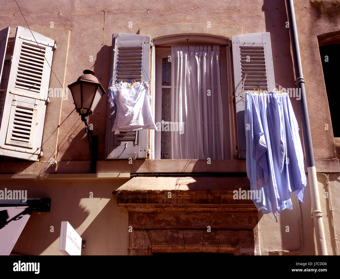 house building window porthole dormer window pane wash washing clothes ...