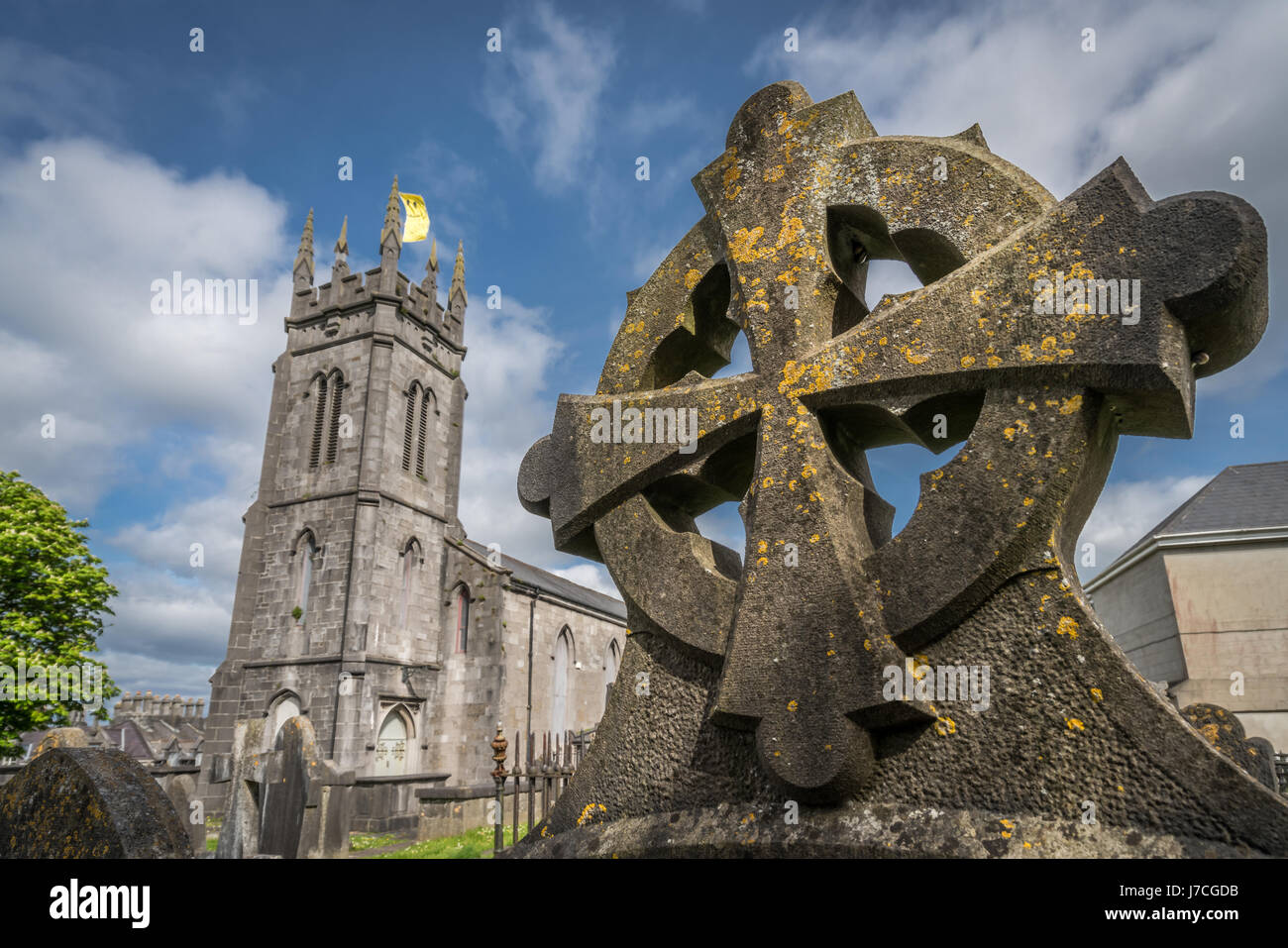Celtic cross on a tomb in a cemetery in Limerick, Ireland Stock Photo ...