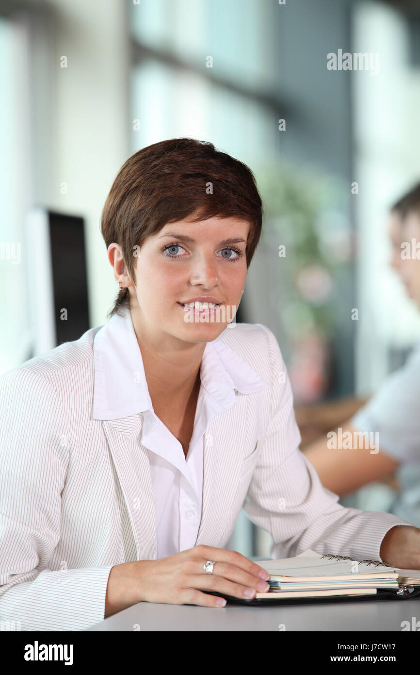 woman telephone phone bank lending institution office desk secretary ...