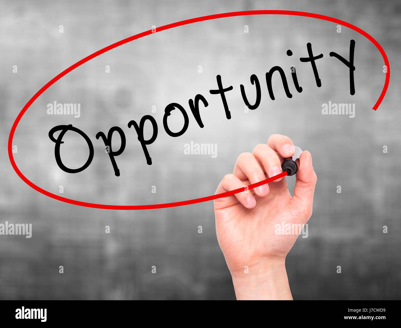Man Hand writing Opportunity with black marker on visual screen ...