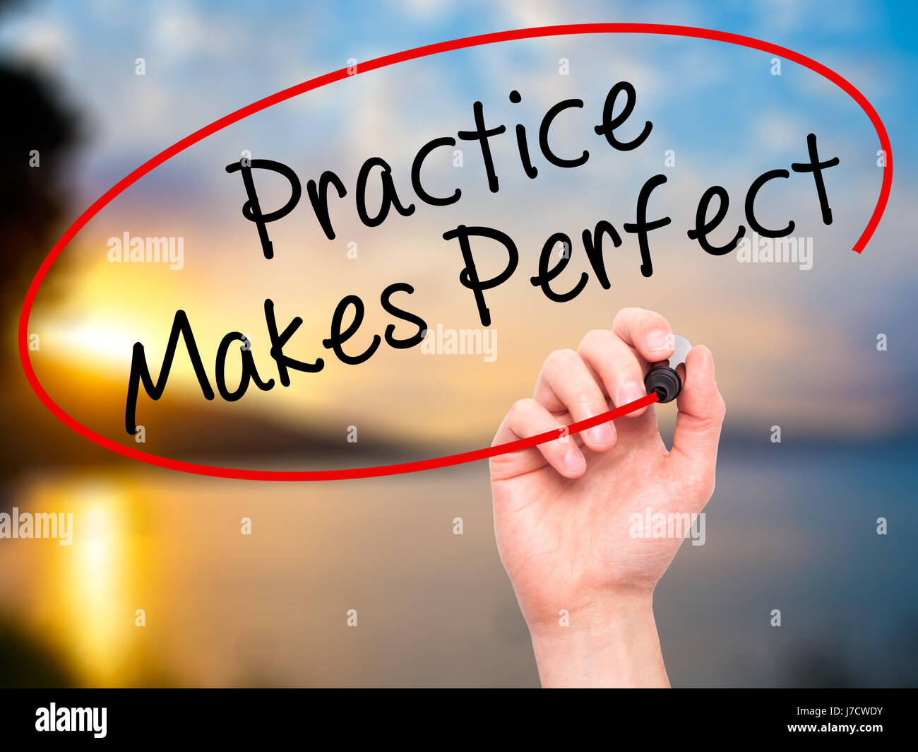 Man Hand writing Practice Makes Perfect with black marker on visual ...