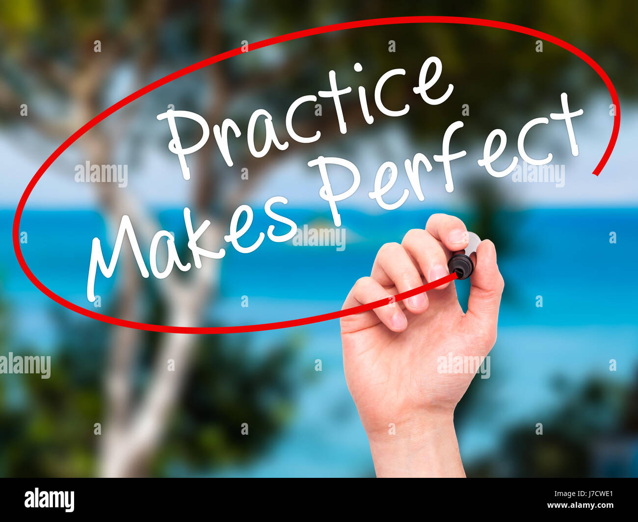 Man Hand writing Practice Makes Perfect with black marker on visual ...