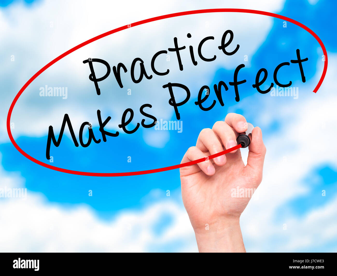 Man Hand writing Practice Makes Perfect with black marker on visual ...