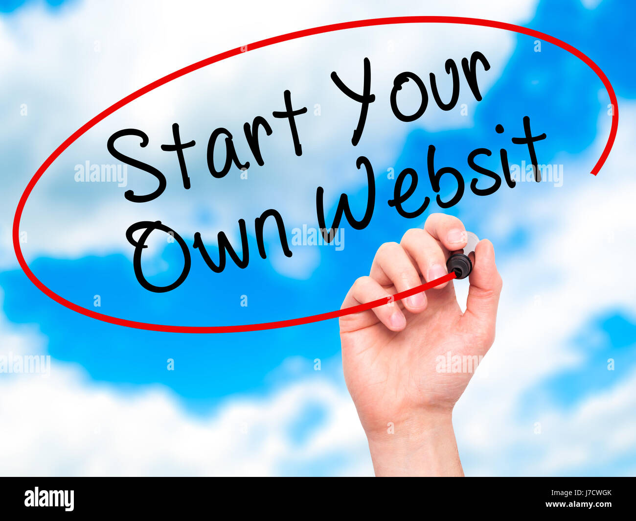 Man Hand writing Start Your Own Website with black marker on visual ...