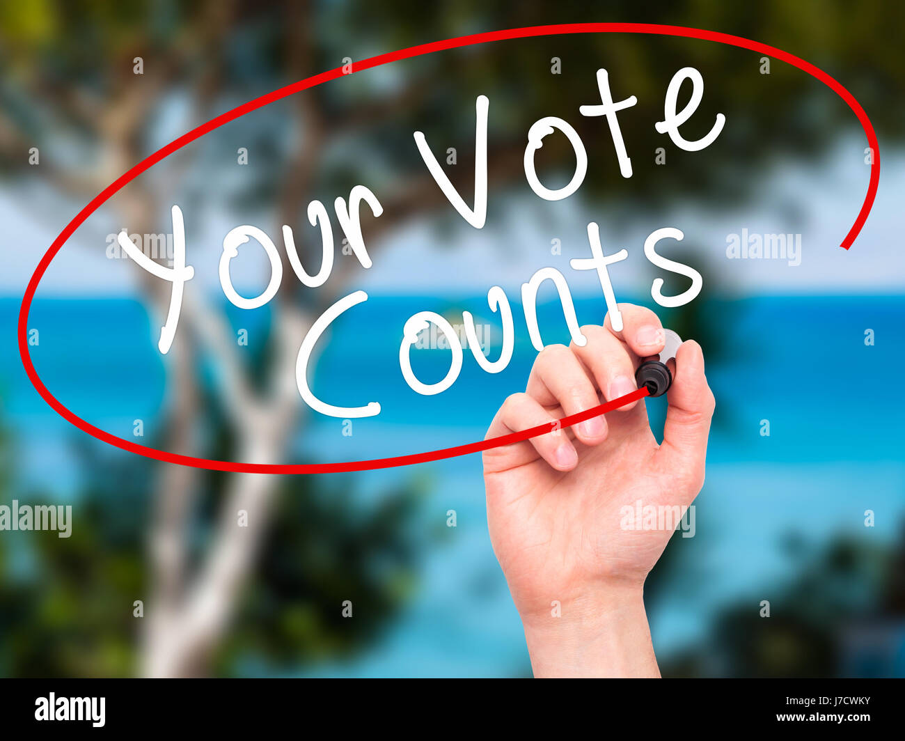 Man Hand writing Your Vote Counts with black marker on visual screen ...