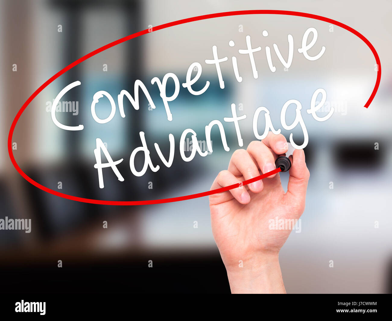 Man Hand writing Competitive Advantage with black marker on visual ...