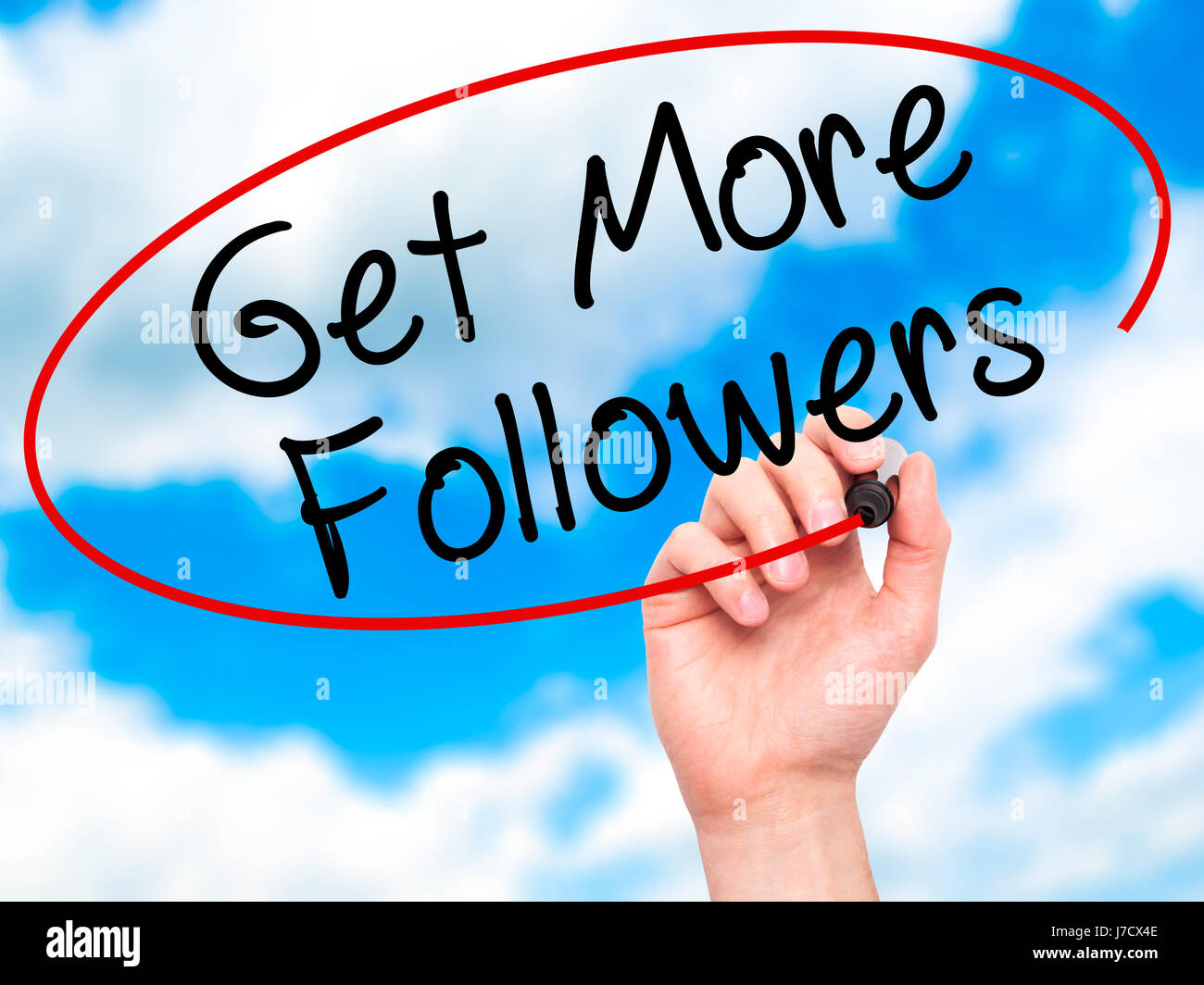 Man Hand writing Get More Followers with black marker on visual screen ...