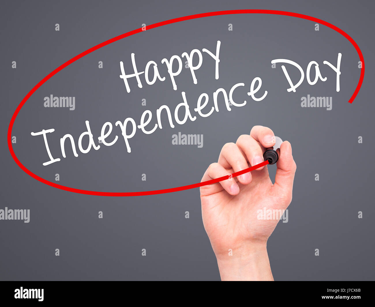 Man Hand writing happy Independence Day with black marker on visual ...