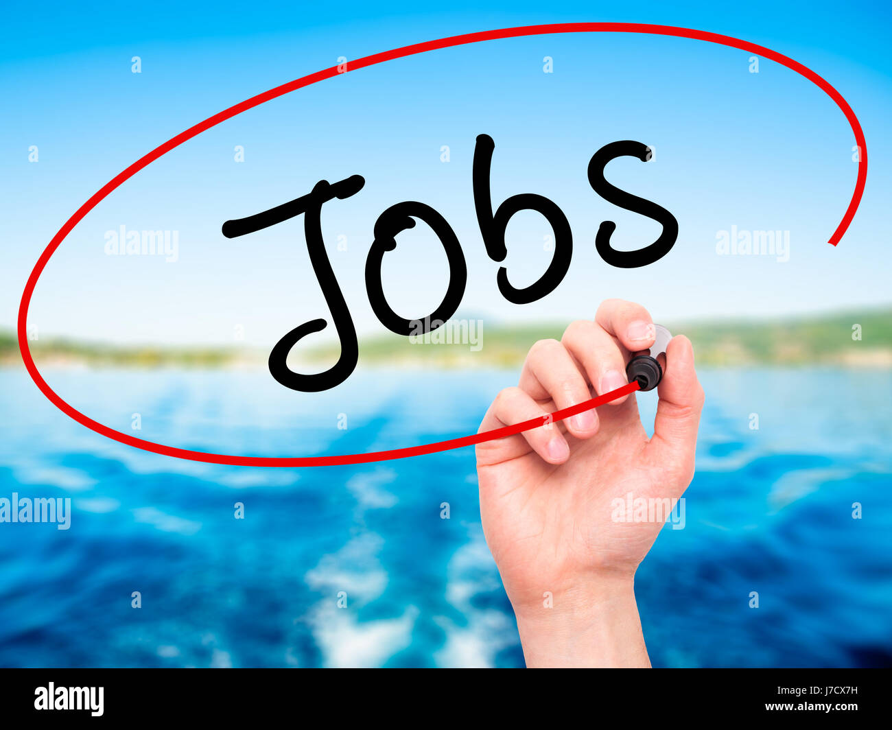 Man Hand writing Jobs with black marker on visual screen. Isolated on ...