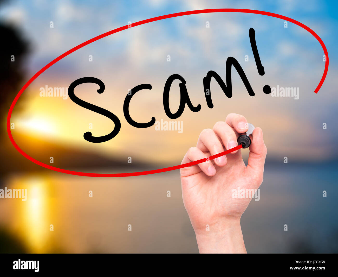 Man Hand writing Scam! with black marker on visual screen. Isolated on ...