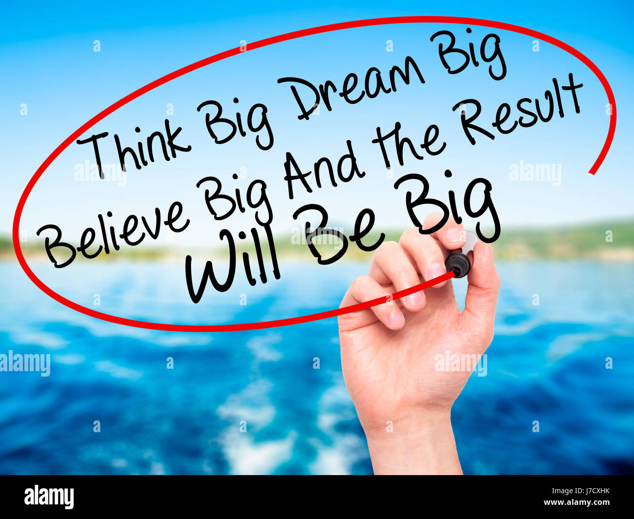 Man Hand writing Think Big Dream Big Believe Big And the Result Will Be Big with black marker on ...