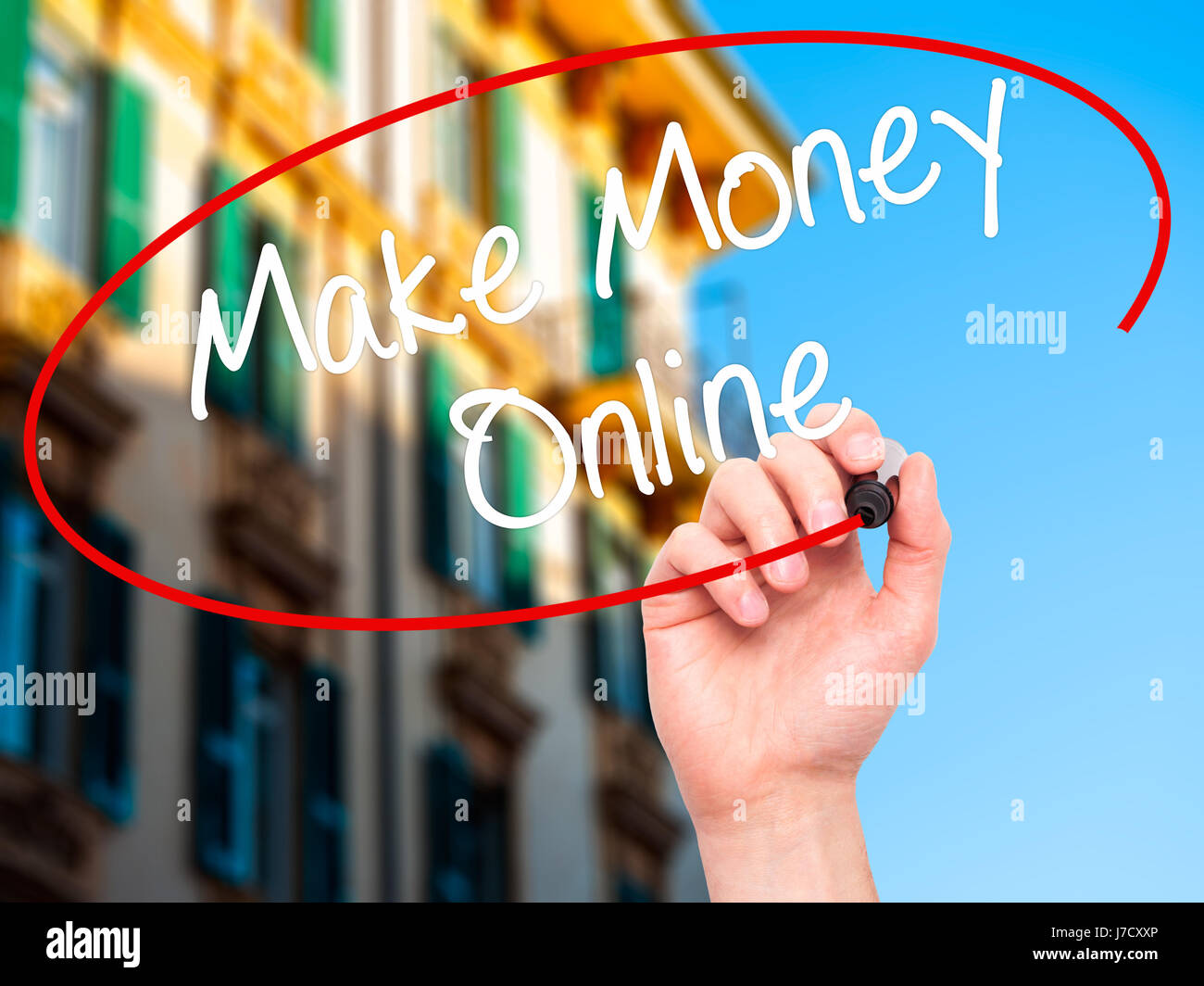 Man Hand writing Make Money Online with black marker on visual screen ...