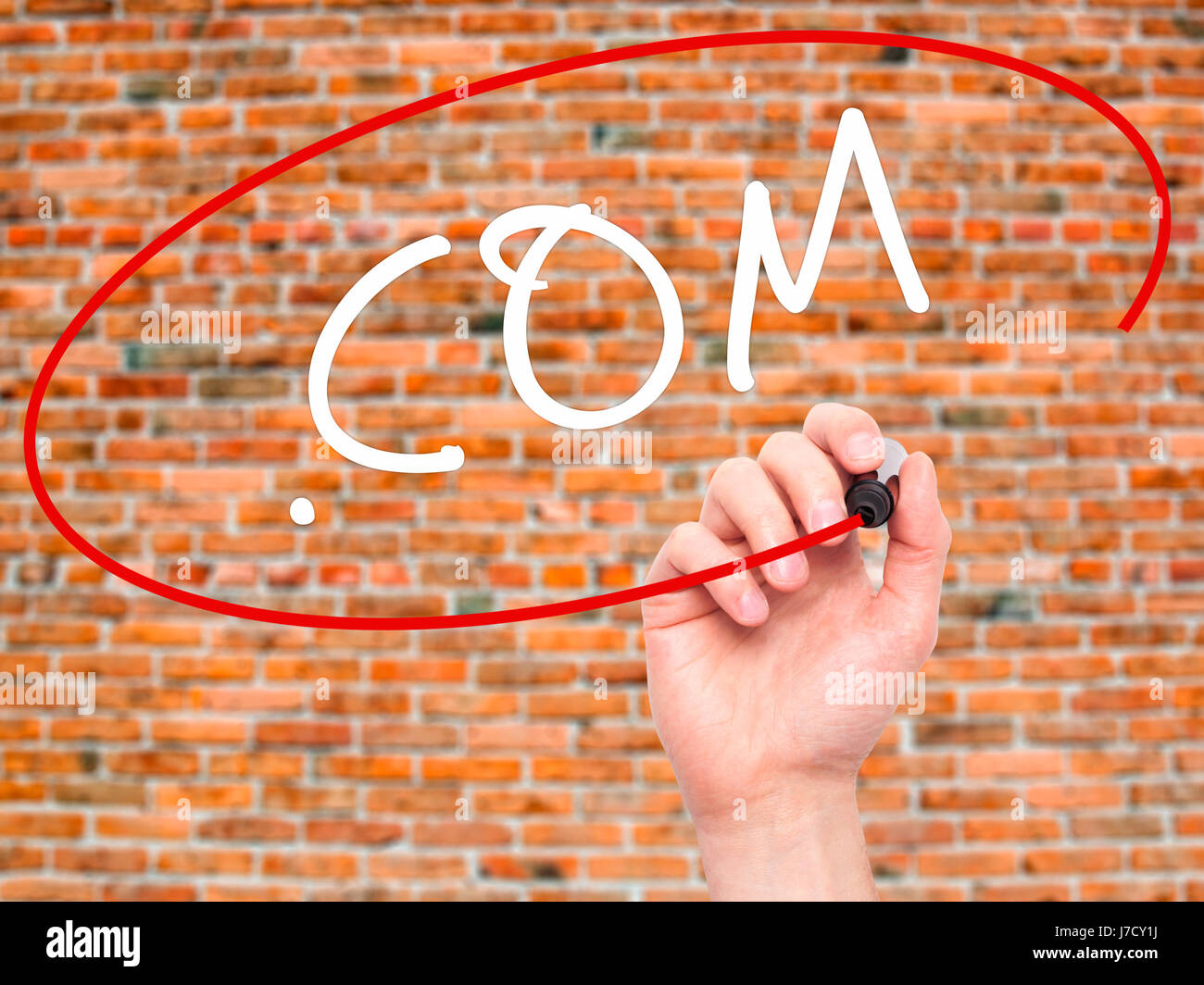 Man Hand writing .COM with black marker on visual screen. Isolated on ...