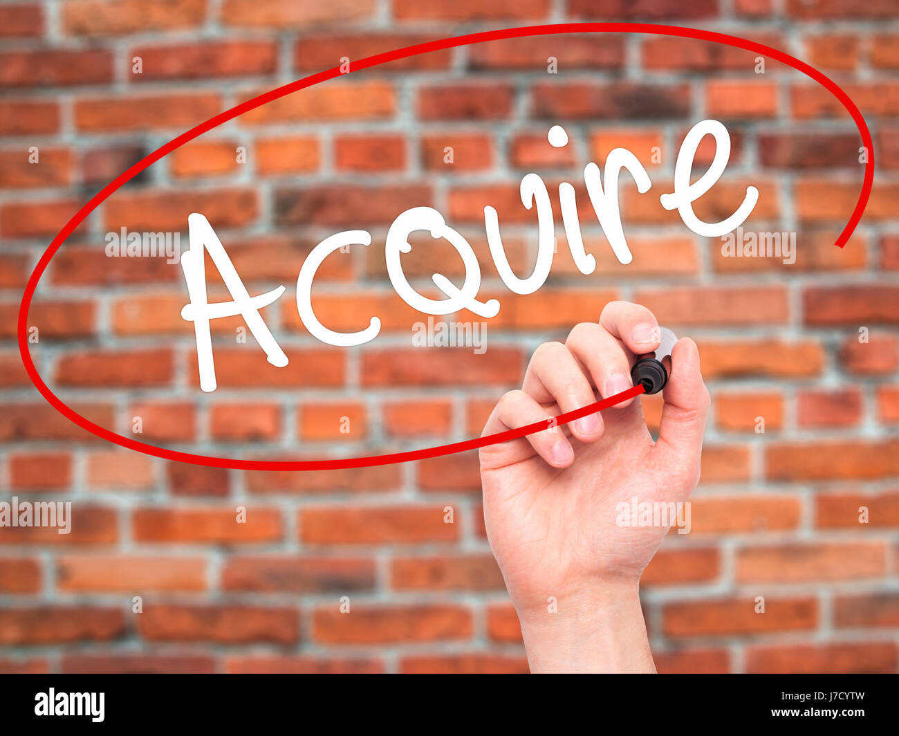 Man Hand writing Acquire with black marker on visual screen. Isolated ...