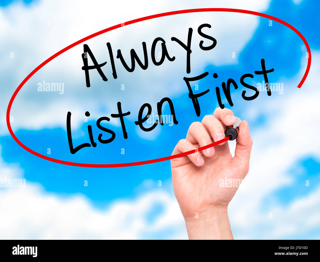 Man Hand writing Always Listen First with black marker on visual screen ...