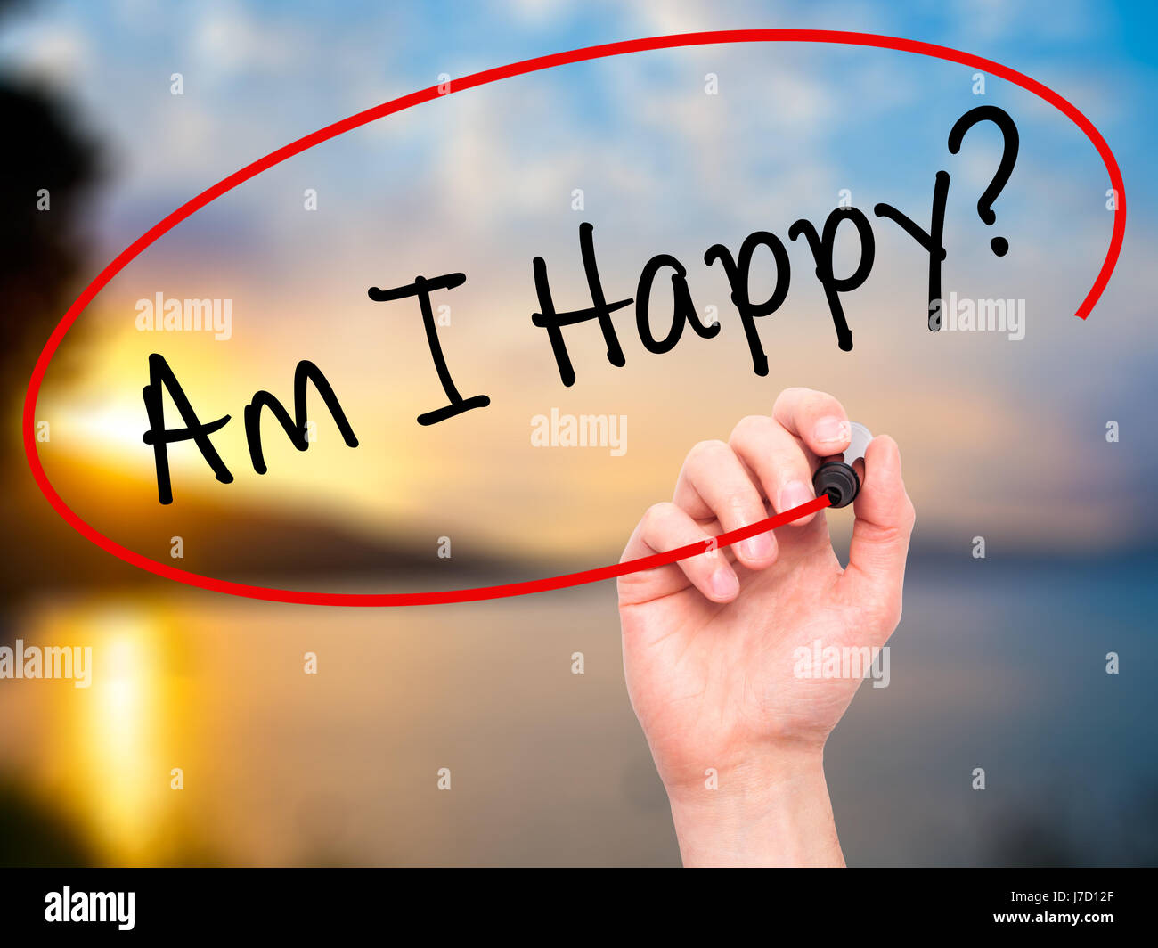 Man Hand writing Am I Happy? with black marker on visual screen ...