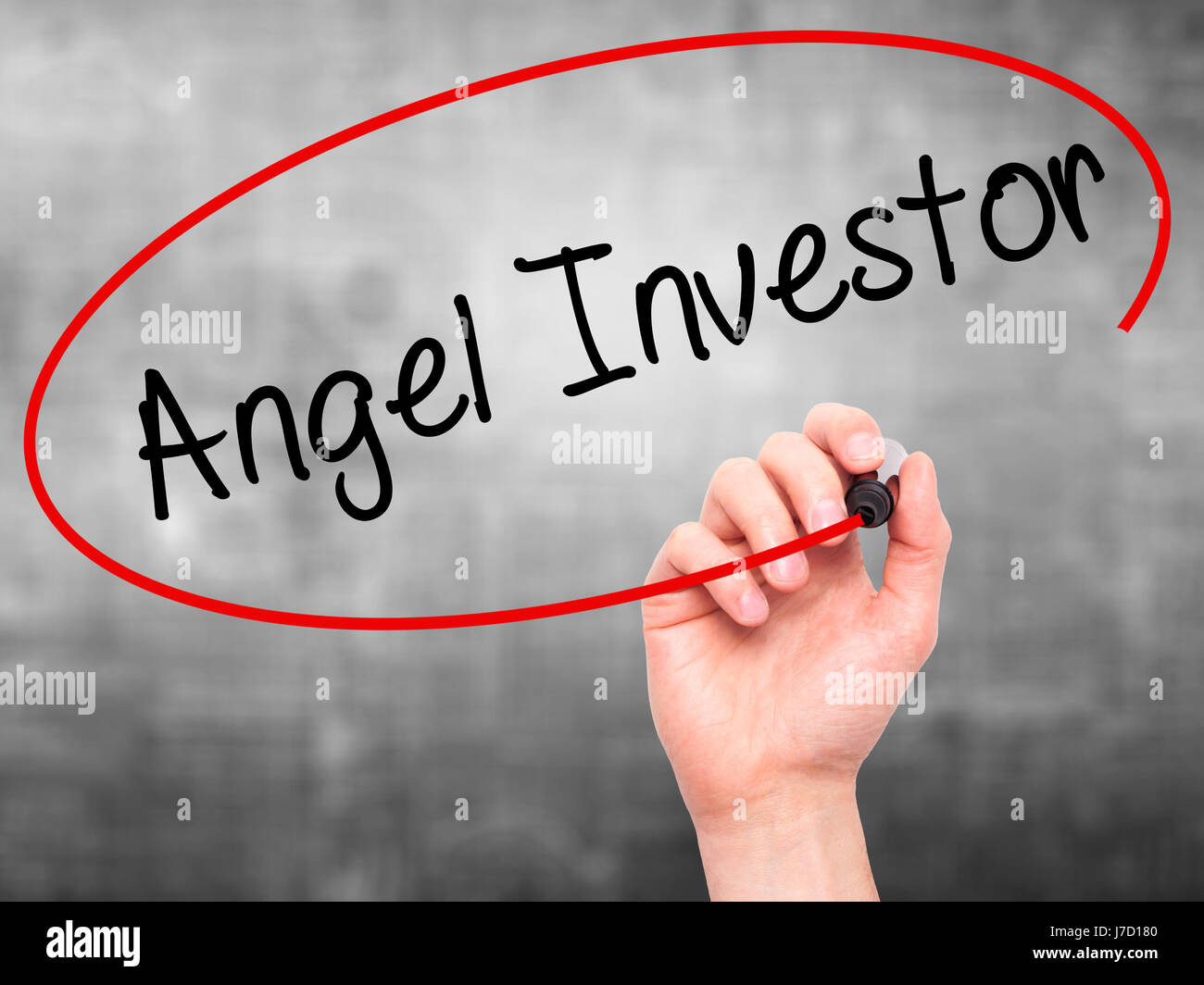 Man Hand writing Angel Investor with black marker on visual screen ...