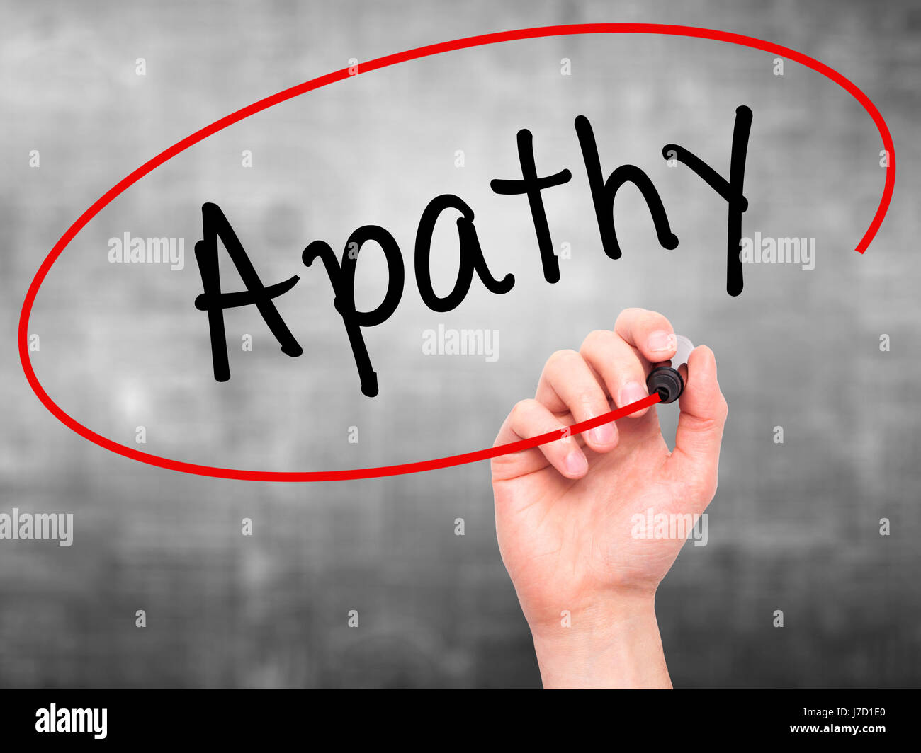 Man Hand writing Apathy with black marker on visual screen. Isolated on ...