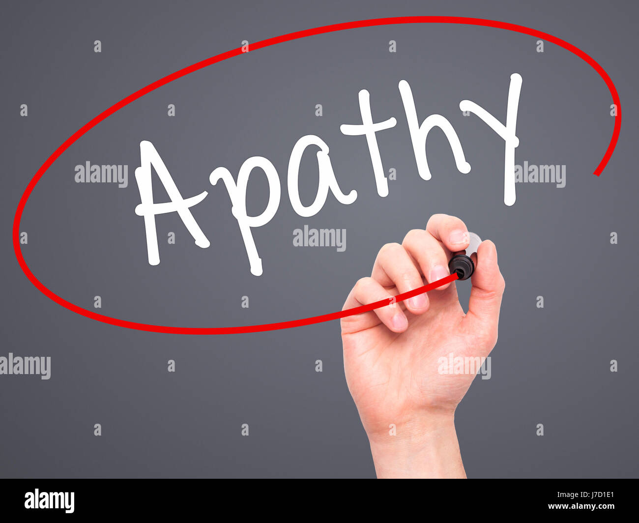 Man Hand writing Apathy with black marker on visual screen. Isolated on ...