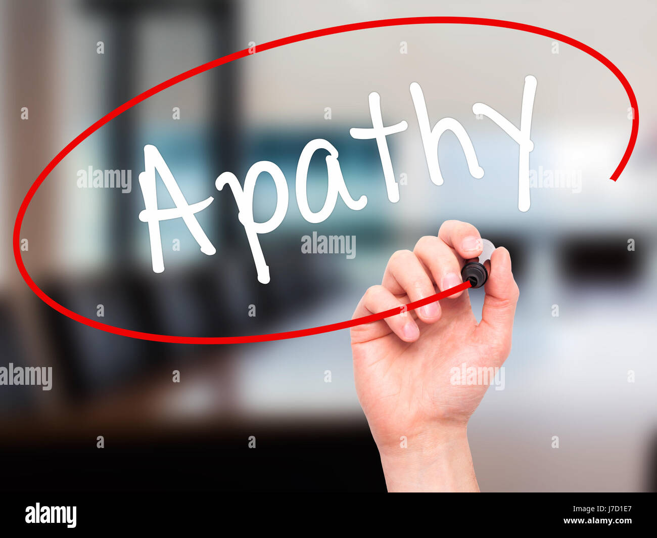 Man Hand writing Apathy with black marker on visual screen. Isolated on ...