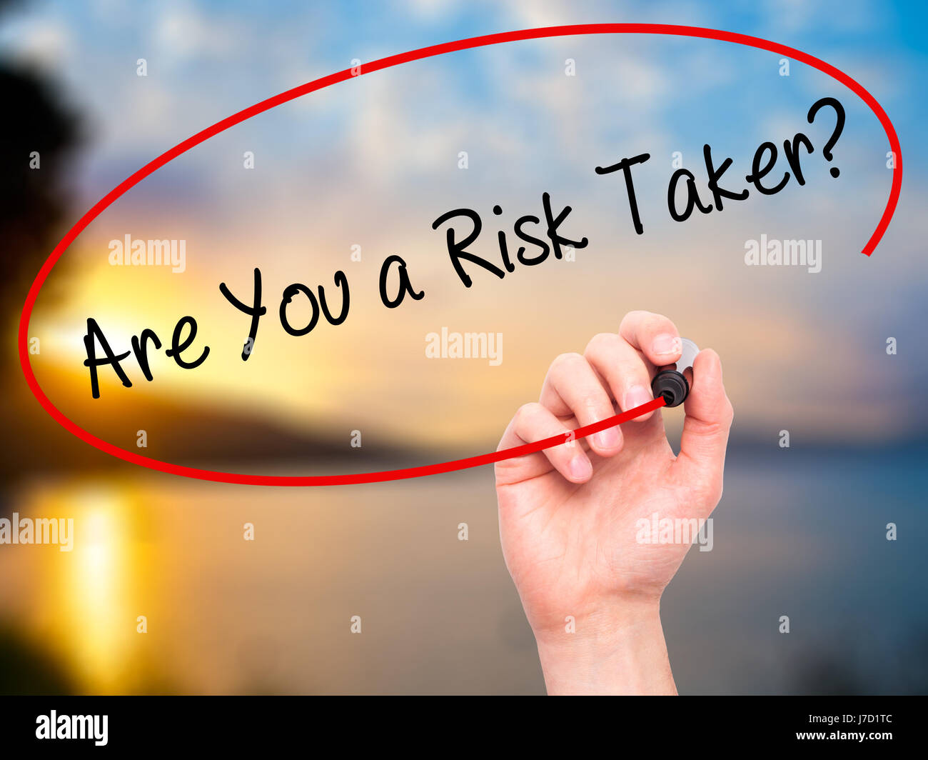 Man Hand writing Are You a Risk Taker? with black marker on visual ...