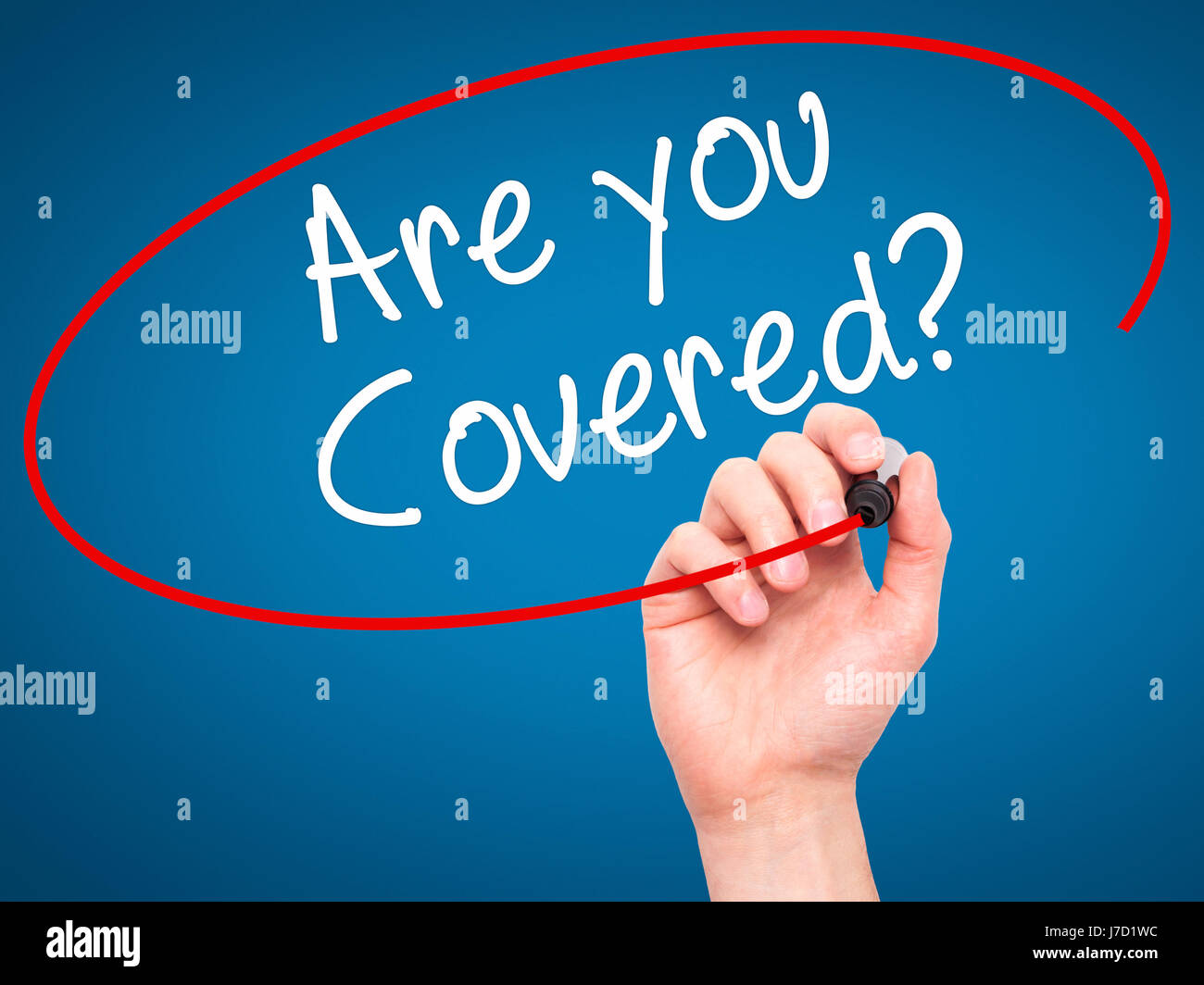 Man Hand writing Are you Covered? with black marker on visual screen ...