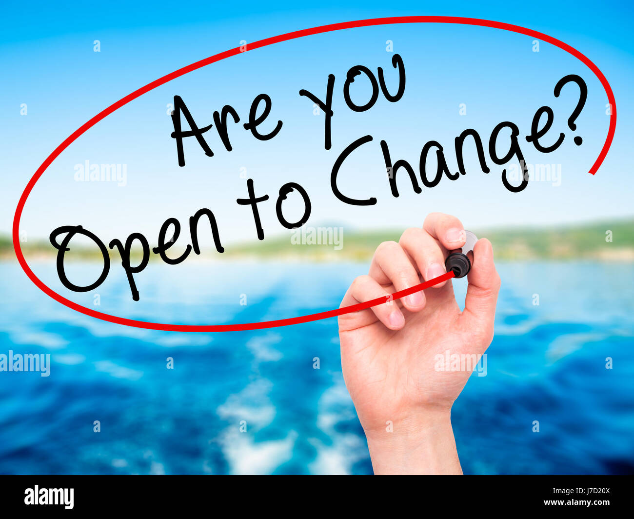 Man Hand writing Are you Open to Change? with black marker on visual ...