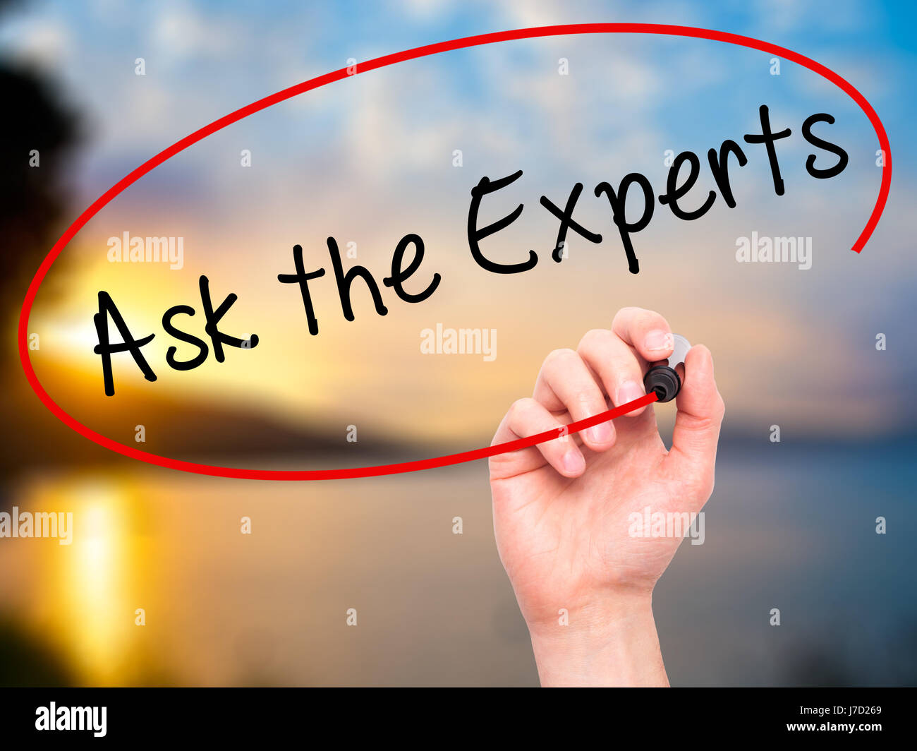 Man Hand writing Ask the Experts with black marker on visual screen ...