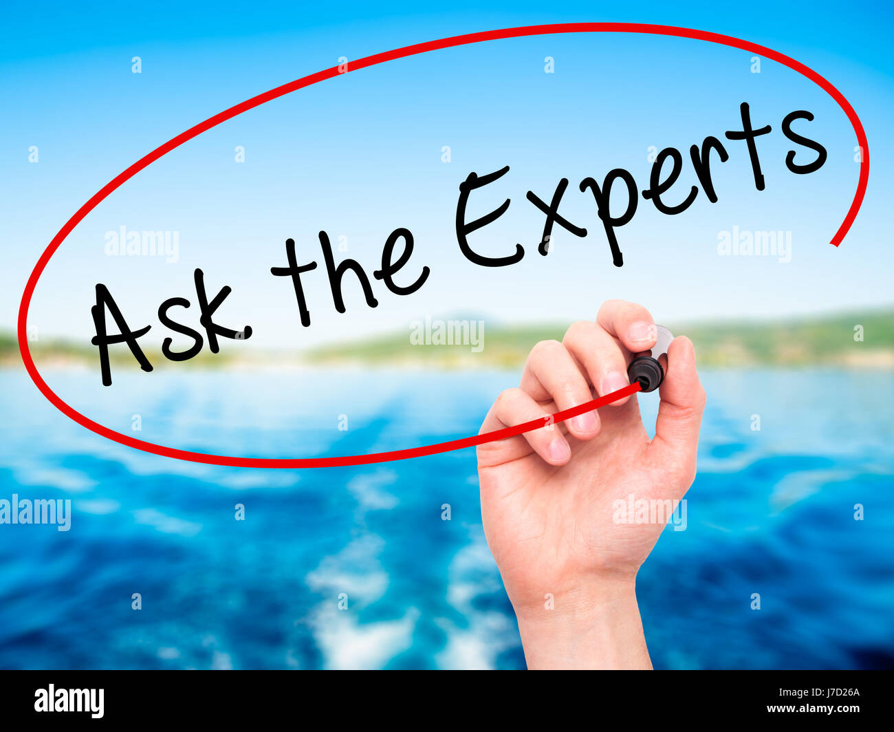 Man Hand writing Ask the Experts with black marker on visual screen ...