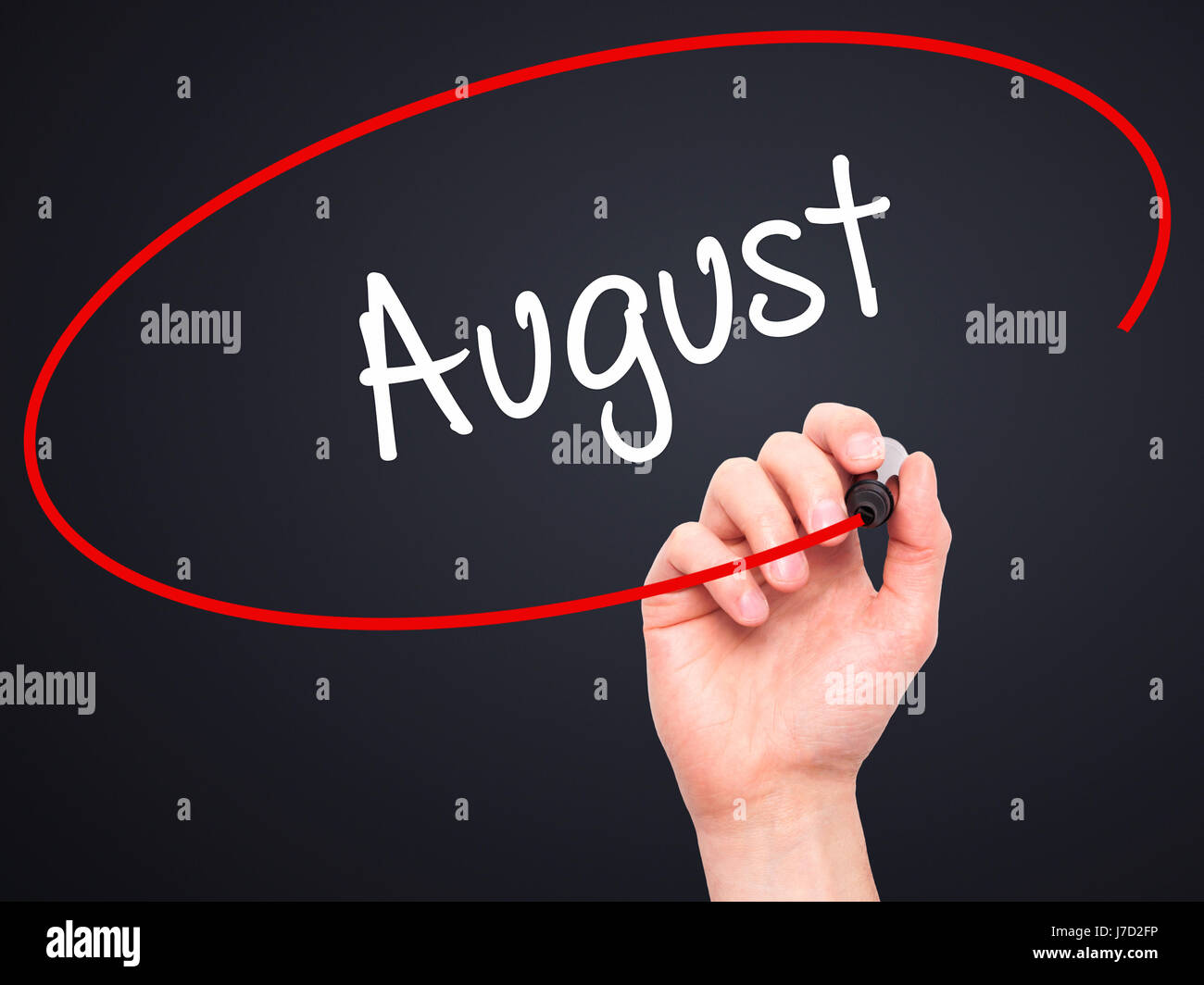 Man Hand writing August with black marker on visual screen. Isolated on ...