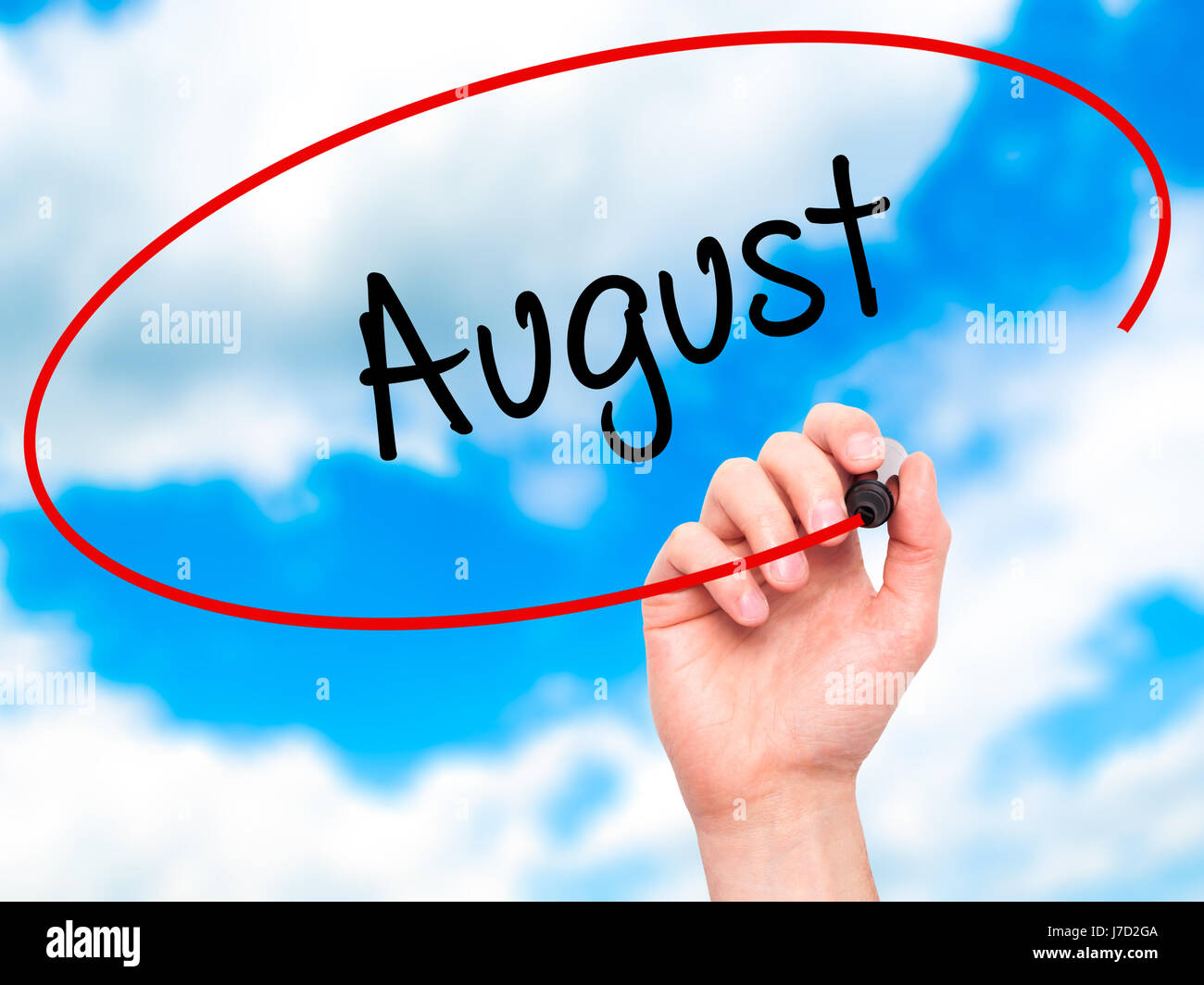 Man Hand writing August with black marker on visual screen. Isolated on ...