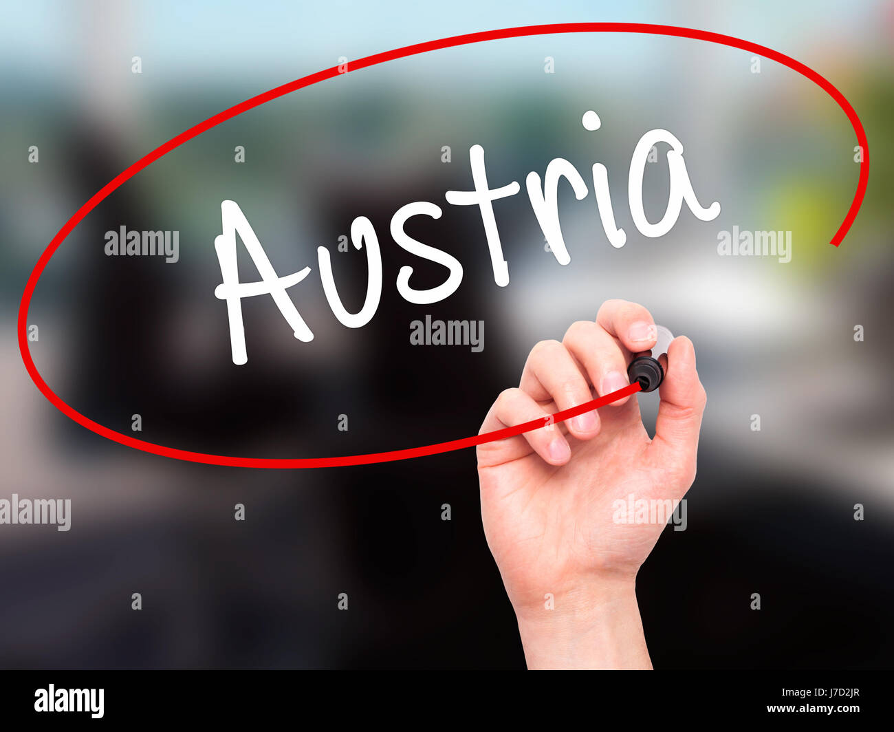 Man Hand writing Austria with black marker on visual screen. Isolated ...