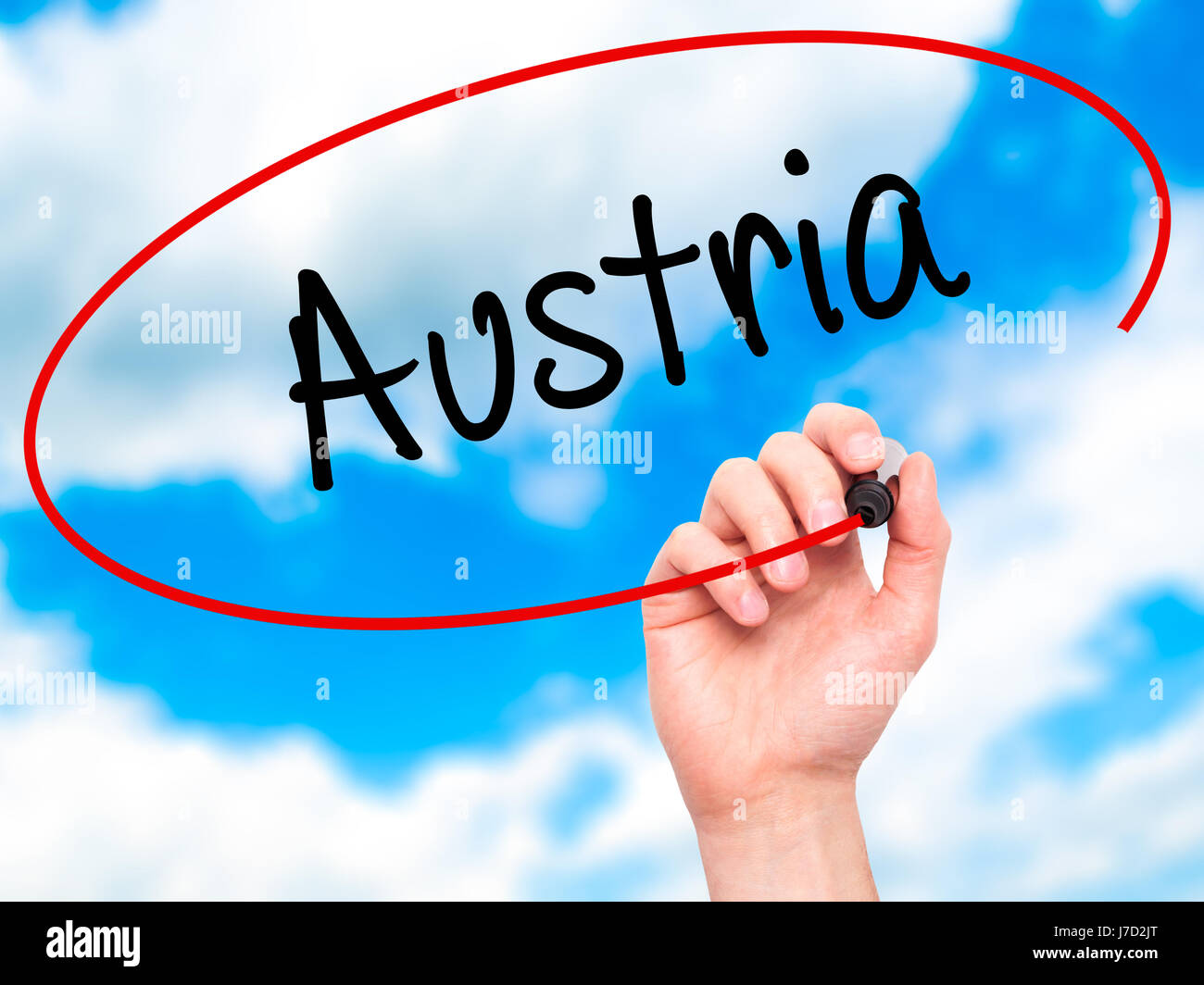 Man Hand writing Austria with black marker on visual screen. Isolated ...